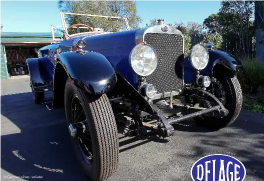 BEHIND THE GARAGE DOOR - PressReader