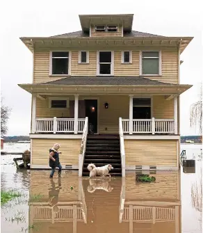 Floods force huge evacuation­s - PressReader