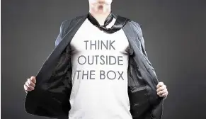 The slogan T-shirt is back - PressReader