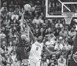 Reality check: Top 10 UF basketball team too much for UM in early ...