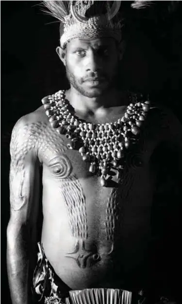 The extraordin­ary ritual of crocodile scarring - PressReader