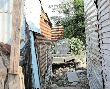 Families build homes on graves - PressReader