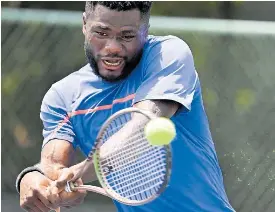 USA’s Cariov, Phillips battle tough conditions to advance - PressReader