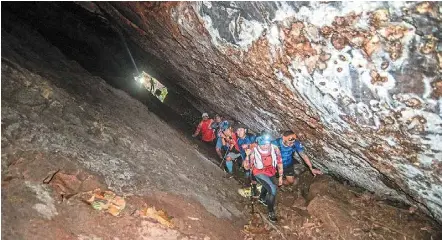Search for hiking trails reveals caverns - PressReader