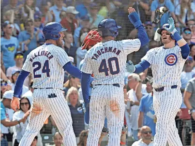 Happ homer helps Cubs beat Cardinals - PressReader
