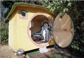 Alone space created through round doors | Penticton Herald | PressReade­r