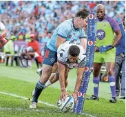 Bulls pull off eight-try romp over Ospreys - PressReader