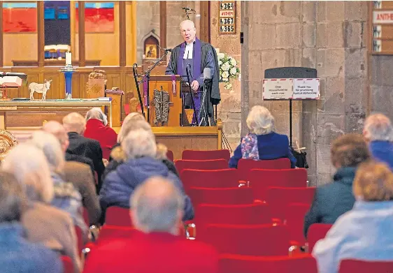 The Rev John Murdoch conducts his Palm Sunday service at St John’s Kirk ...