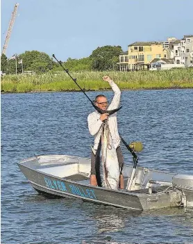 Fisherman towed by fish, catches 135 pound-tuna in Raritan Bay ...