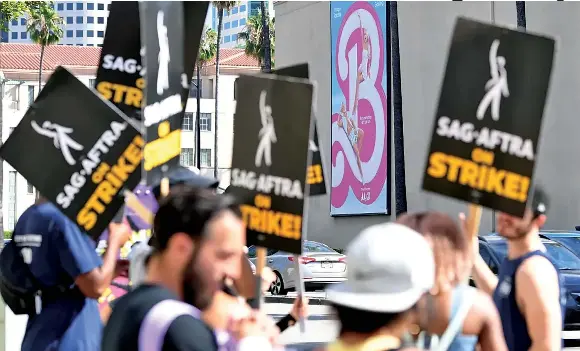 No Deal Yet as Hollywood Writers, Studios Talk for Third Straight Day - PressReader