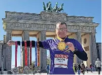 Challenge complete Keegan earns his big Superhalf medal - PressReader