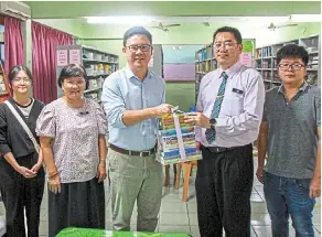 Sibu MP gives books to 60 schools - PressReader