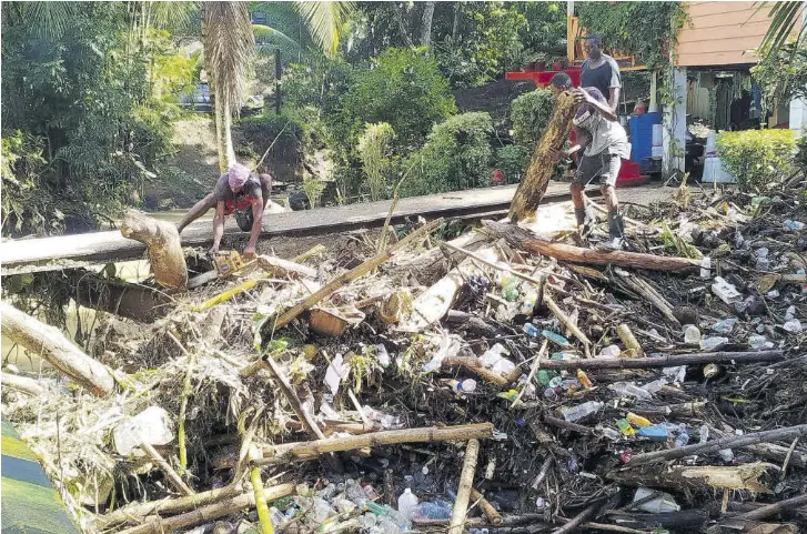 Woman, two children make narrow escape from raging flood waters - PressReader