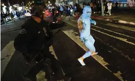 Bus set on fire and 12 arrests made in LA as crowds celebrate Dodgers ...