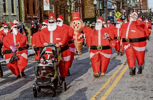Santas sans reindeer — and pants — braved the cold at annual Speedo ...
