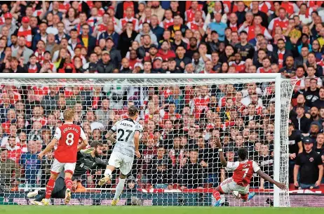 Saka punch floors Liverpool as Arsenal storm back to the top - PressReader