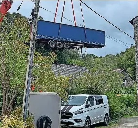 Life returns to normal in village after stuck lorry is craned clear ...