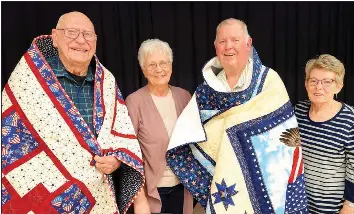Carroll and Jones receive Quilts of Valor - PressReader