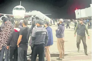 Hundreds storm airport in riot over arrival of plane from Israel ...