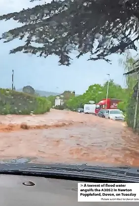 Flood alerts after torrential storms - PressReader