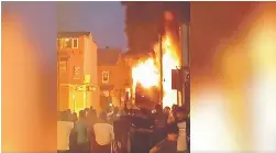 Bus set on fire in Leeds as riots break out - PressReader