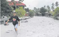 Torrent of ‘dangerous’ volcanic mudflow hits Philippine village - PressReader