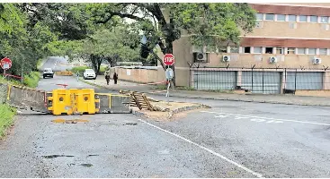 Man narrowly escapes as road collapses - PressReader