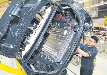BMW to create local EV battery plant - PressReader