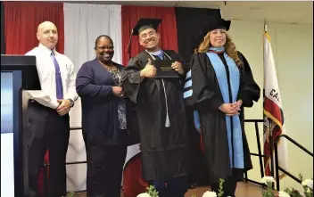 Scores of inmates graduate IVC - PressReader