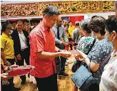 Buddhist charity to distribute $1.3m in hongbao to some 12,000 ...