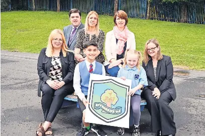Creative kids design badge for new school - PressReader