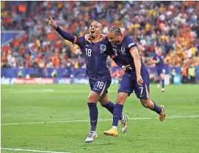 Malen double helps Dutch reach Euro quarterfin­als 3-0 - PressReader