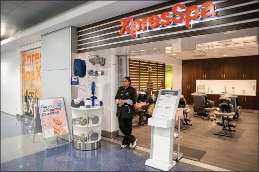 Travelers at Las Vegas airport give thumb’s up to robot manicurist ...