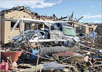 Clean-up after two tornadoes strike - PressReader