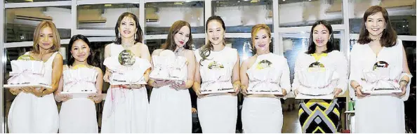 OF LAVISH LAUGHTER & CELEBRATOR­Y CHARM - PressReader