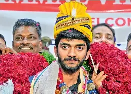 Gukesh home to rousing welcome - PressReader
