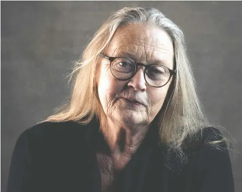 Holcomb revisits old, new in latest album - PressReader