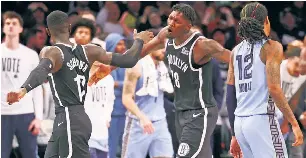 Shorthande­d Nets bearly survive Grizz - PressReader