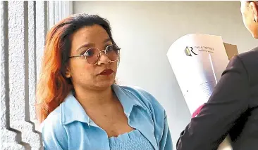 Woman faces new contempt charge - PressReader