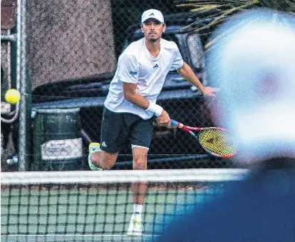 Game, set, match for doubles specialist - PressReader