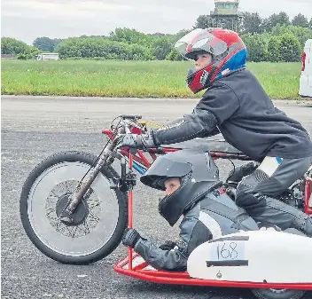 Youngsters achieve new land speed record for motorbike and sidecar - PressReader