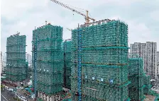 China to almost double support for unfinished housing projects - PressReader