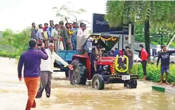 Tractors come to the rescue as floods submerge Bengaluru - PressReader