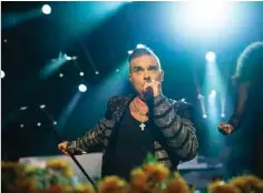 Robbie Williams vender tilbage til Danmark til februar - PressReader