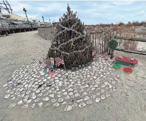 Christmas tree on NJ beach branches into beloved event - PressReader