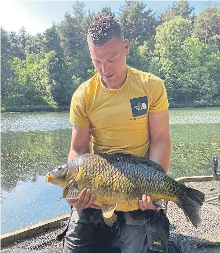 Colin the giant carp landed and returned to the water at Eliburn ...