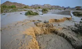 Flood surge in Sudan bursts dam, destroying villages and killing dozens ...