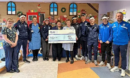 Footballer­s’ cheque a winner with RUH - PressReader