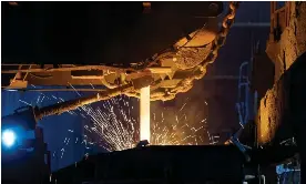 UK business activity expands in ‘encouragin­g start to second half of ...