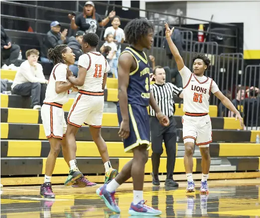 LIONS PREVAIL AT BUZZER - PressReader